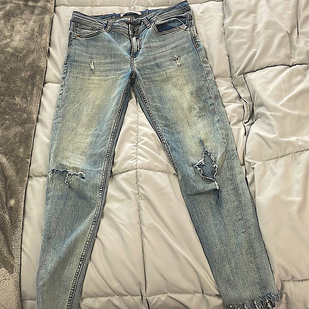 Ripped Jeans With Crystal Detailing - Gem